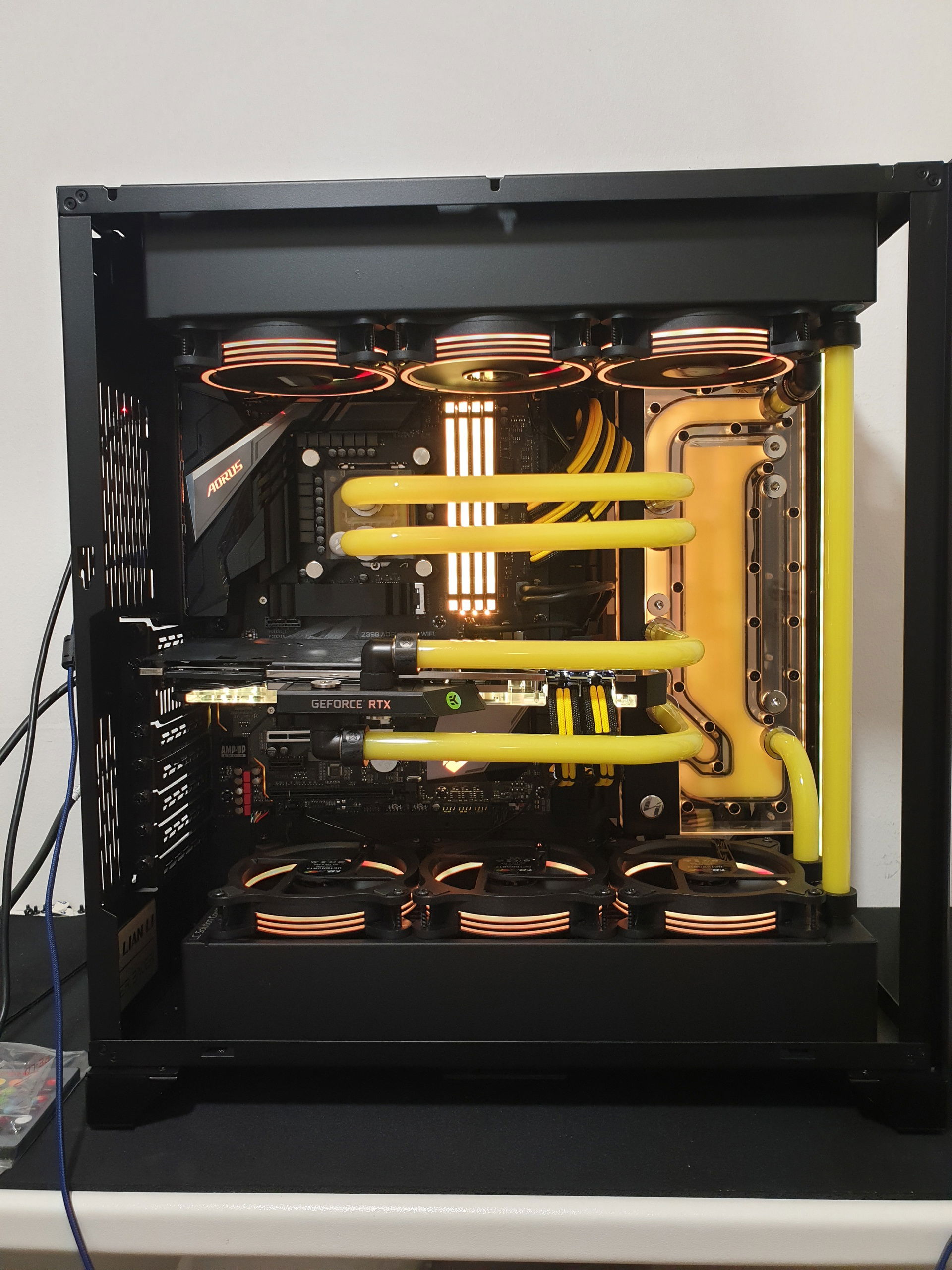 Lian Li O11 XL, custom loop, front distro plate, black & yellow » builds.gg