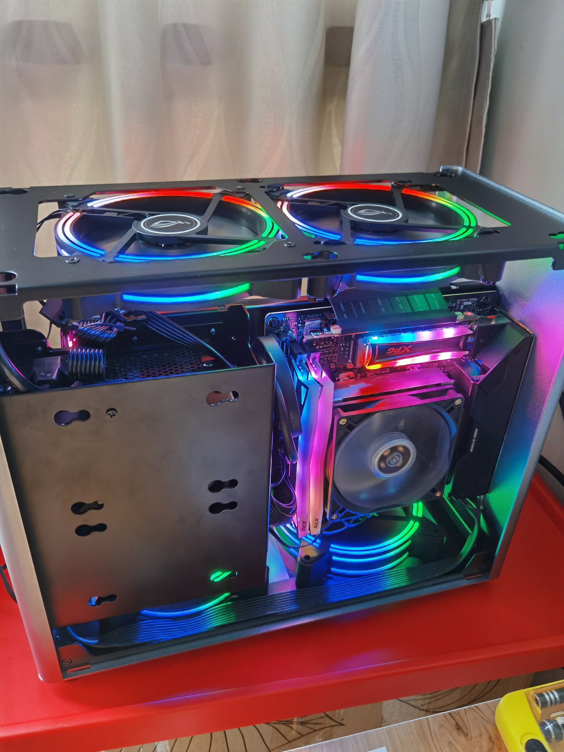 ROG themed SFFPC. Full RGB in a Jonsbo A4 double-sided tinted glass ...