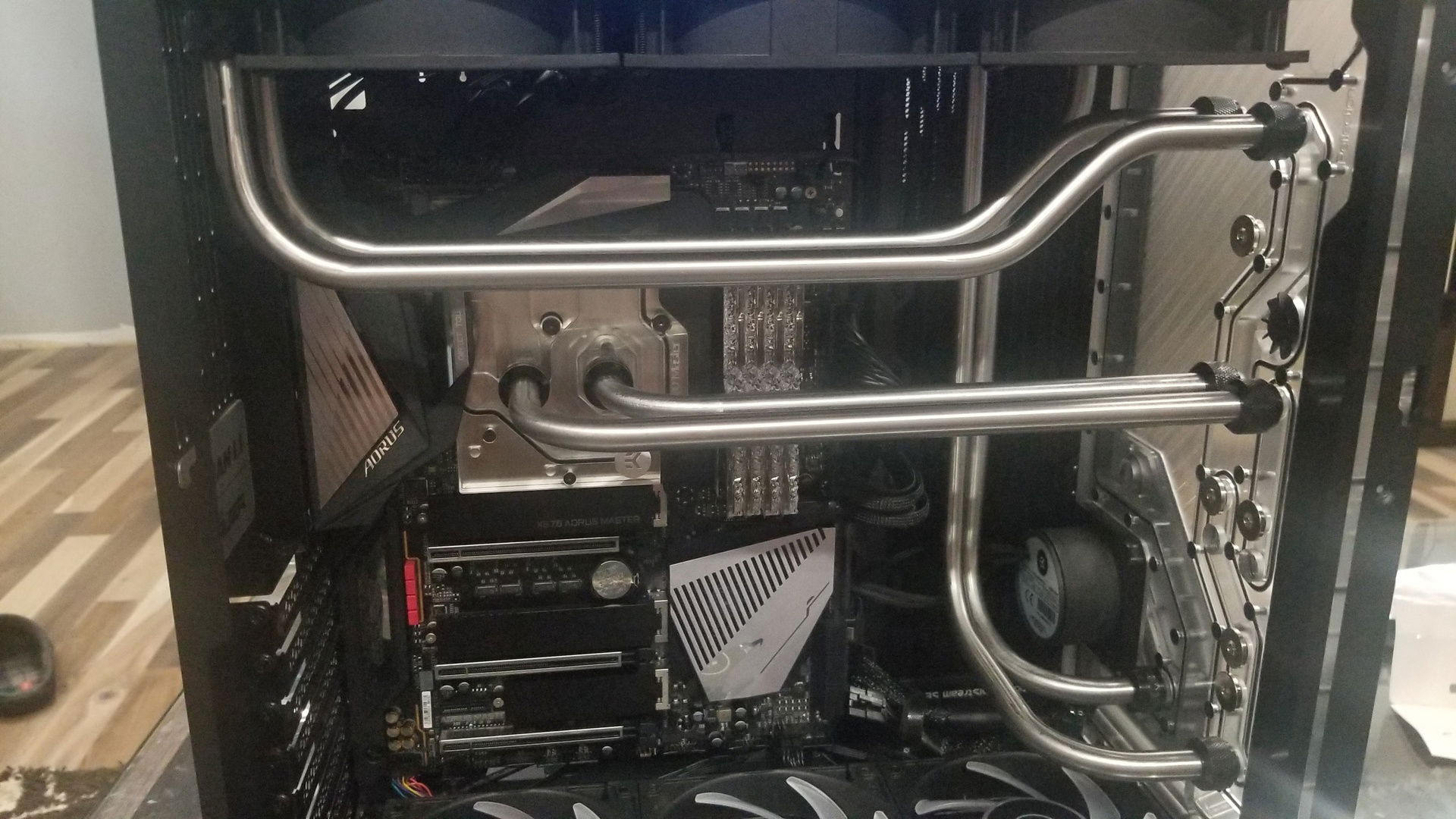 Stainless "pipe dream" PC build w/ custom built desk! » builds.gg